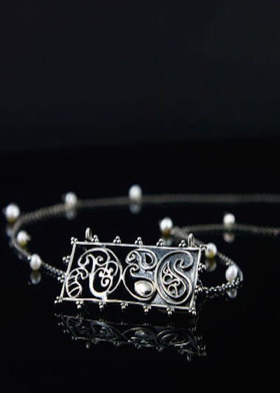 Artistic rectangular paisley pendant with pearl accented chain and fine ...